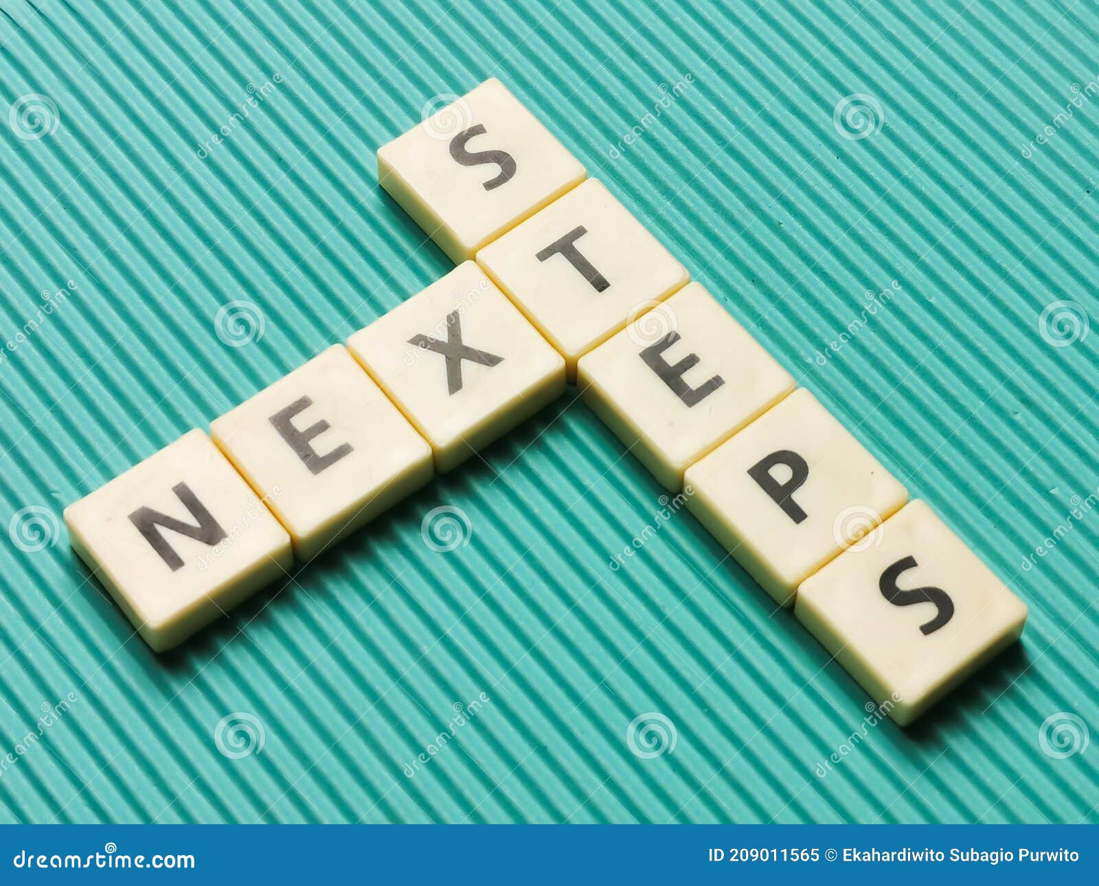 NEXT STEPS Crossword Made from Square Letter Tiles Stock Image - Image ...
