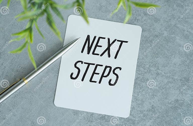 NEXT STEPS Text on Paper Sheet with Chart, White Paper and Pen Stock ...