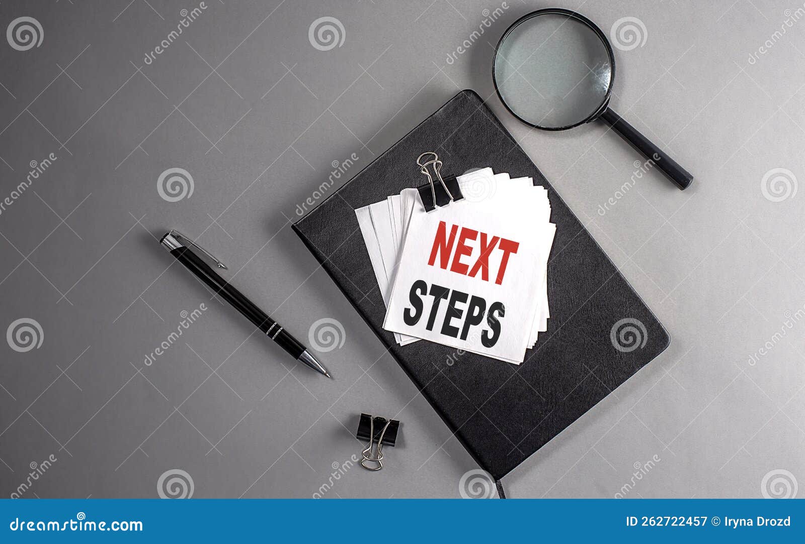 NEXT STEPS Text on a Sticky on Black Notebook , Business Concept Stock ...