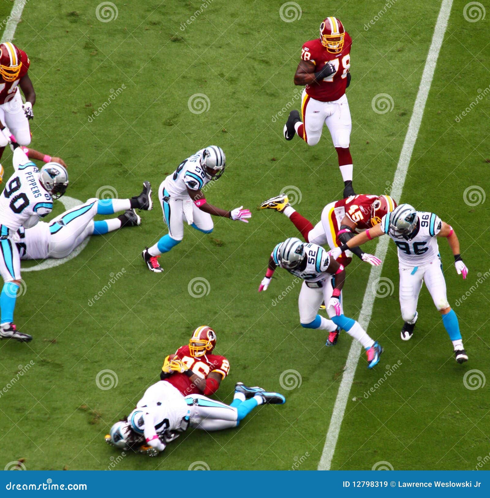 NFL - end of a play editorial stock image. Image of grass - 12798319