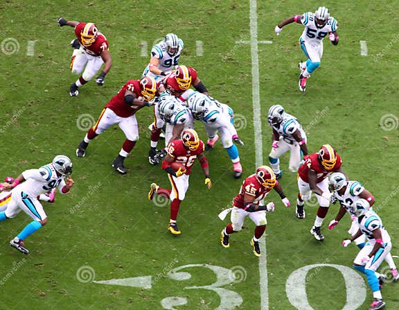 NFL - Move the Pile, Hit the Hole! Editorial Image - Image of outdoors ...