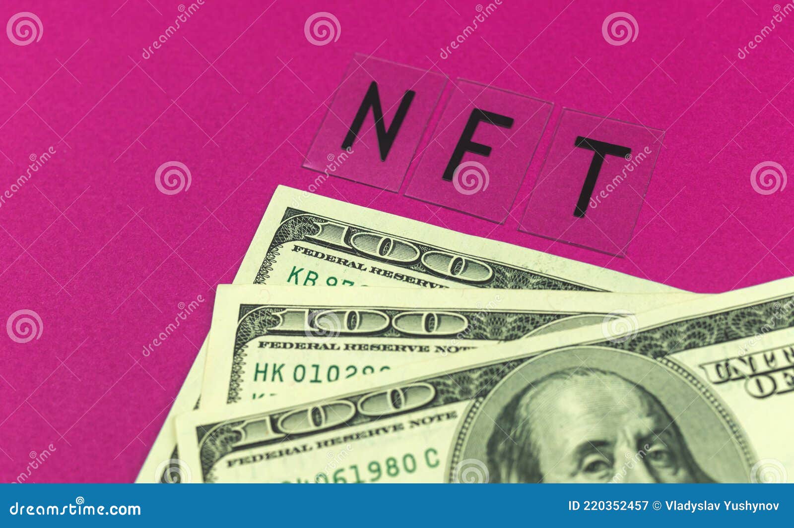 NFT and Dollar Bills on the Office Table with Purple Background Stock ...