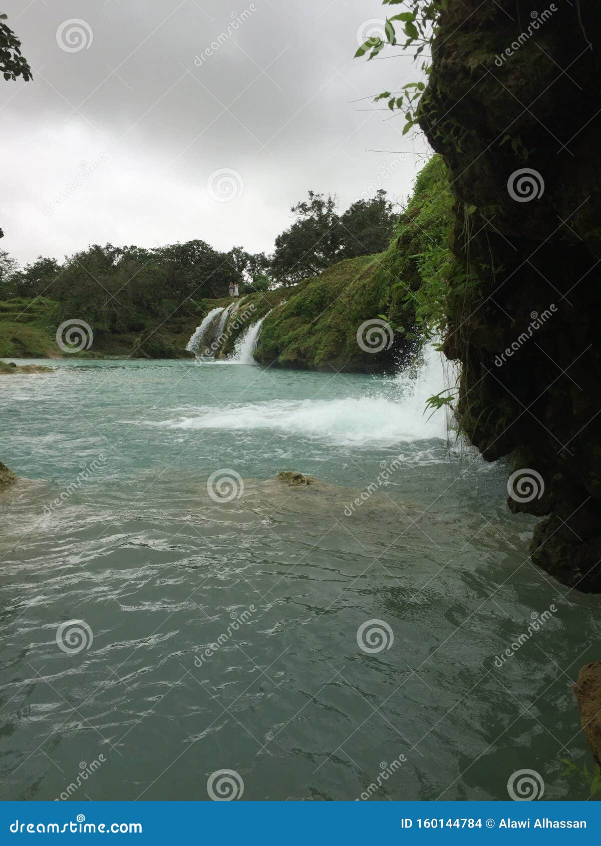 Side view of waterfall stock photo. Image of mountains - 160144784