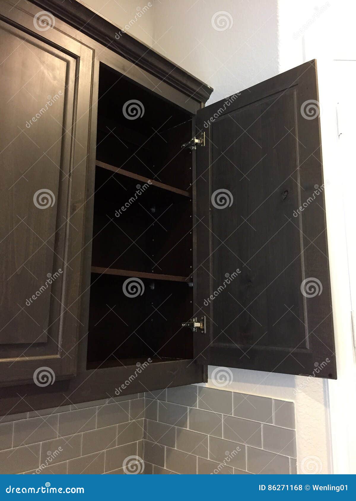 Nice Black Cupboard in a New House Stock Photo - Image of sideboard ...