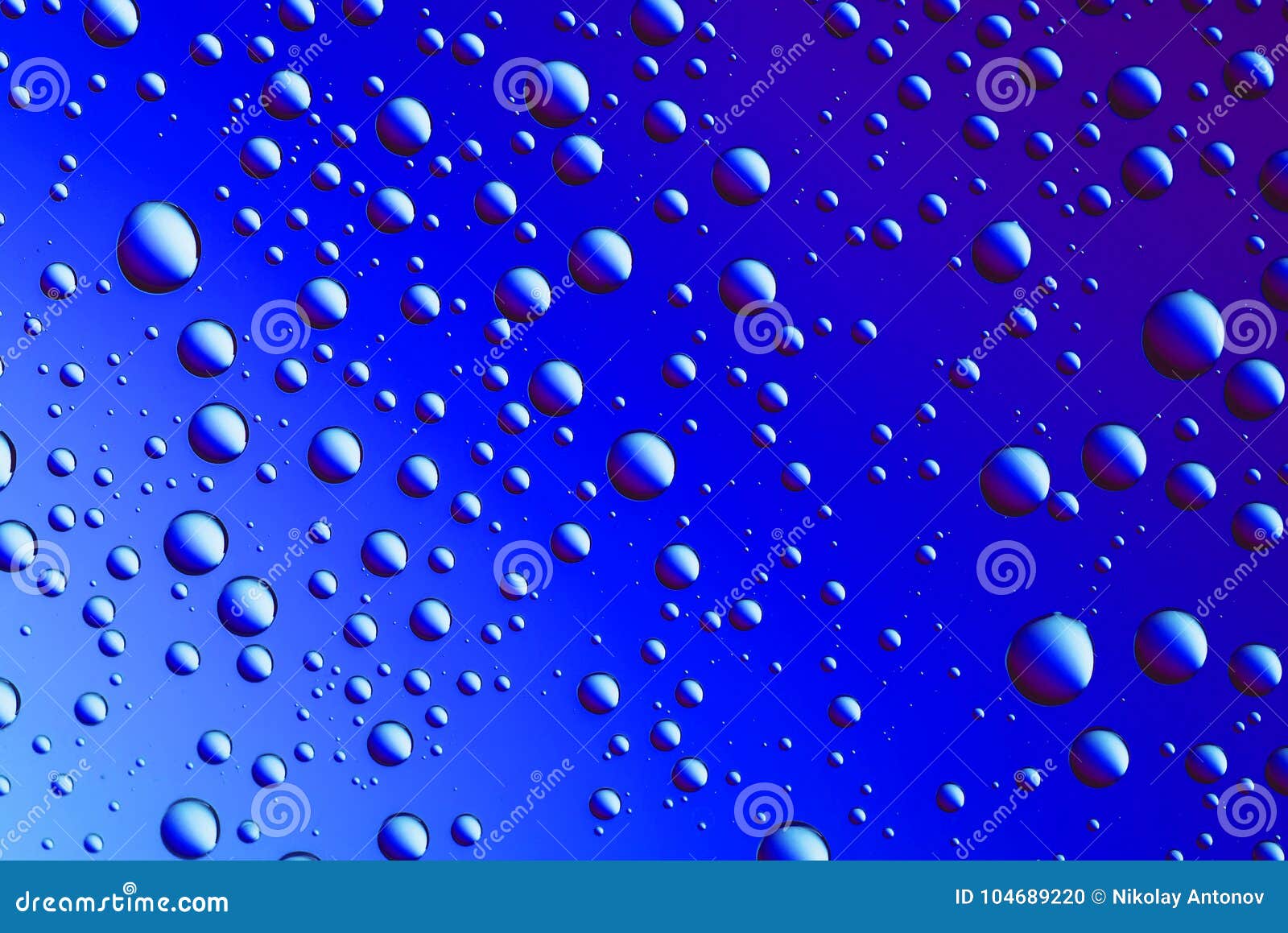 Nice Blue Gradient Color Background from Drops of the Different Size ...