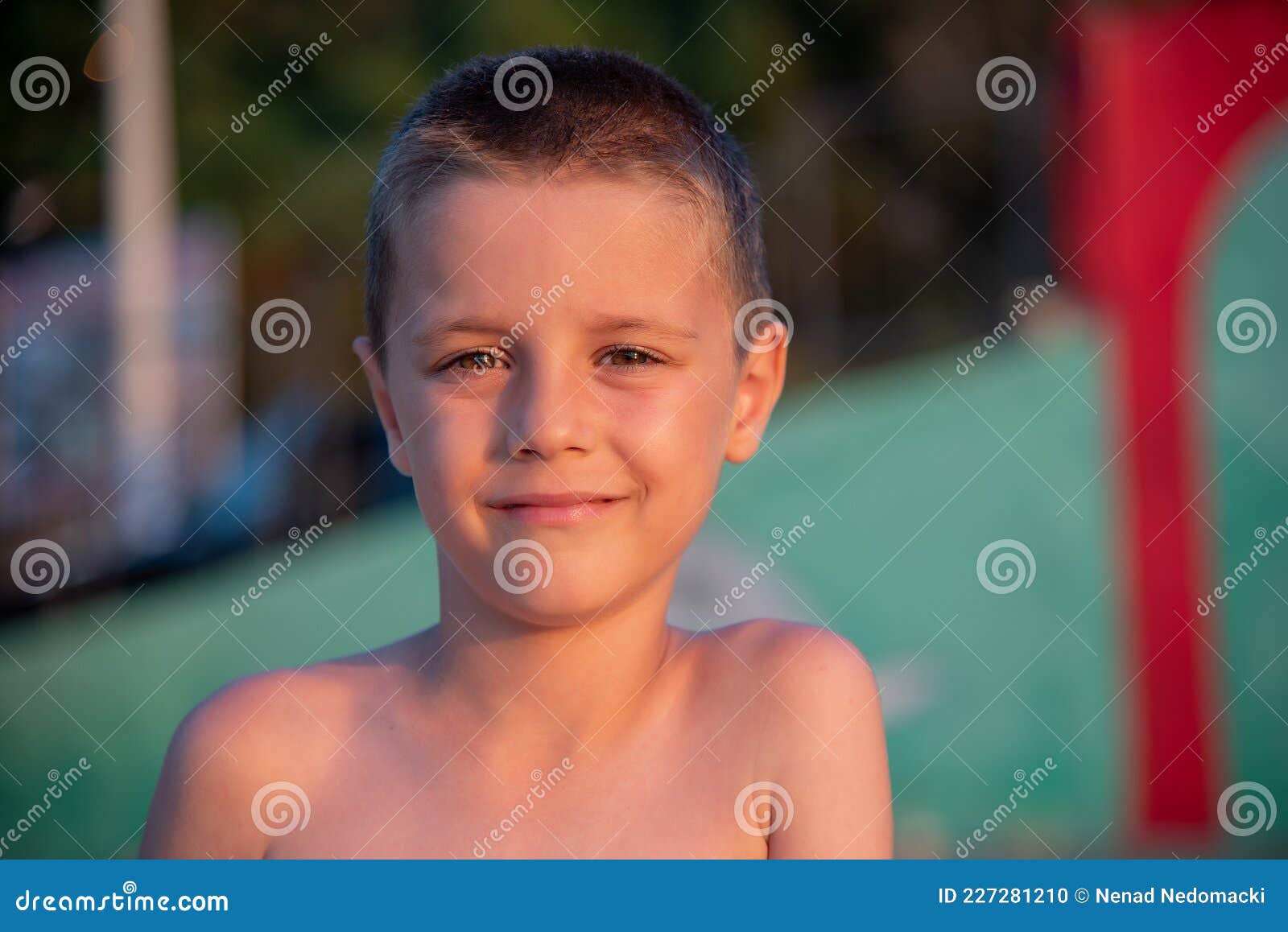 A Nice Boy on the Beach at Sunset Stock Photo - Image of heat, adult ...