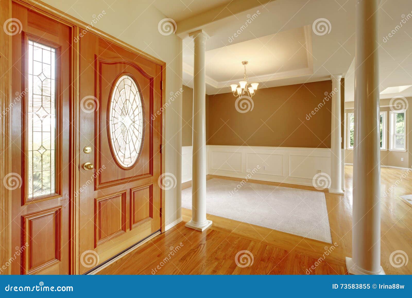 Nice Bright Entry Way To Home with Hardwood Floor Stock Image - Image ...