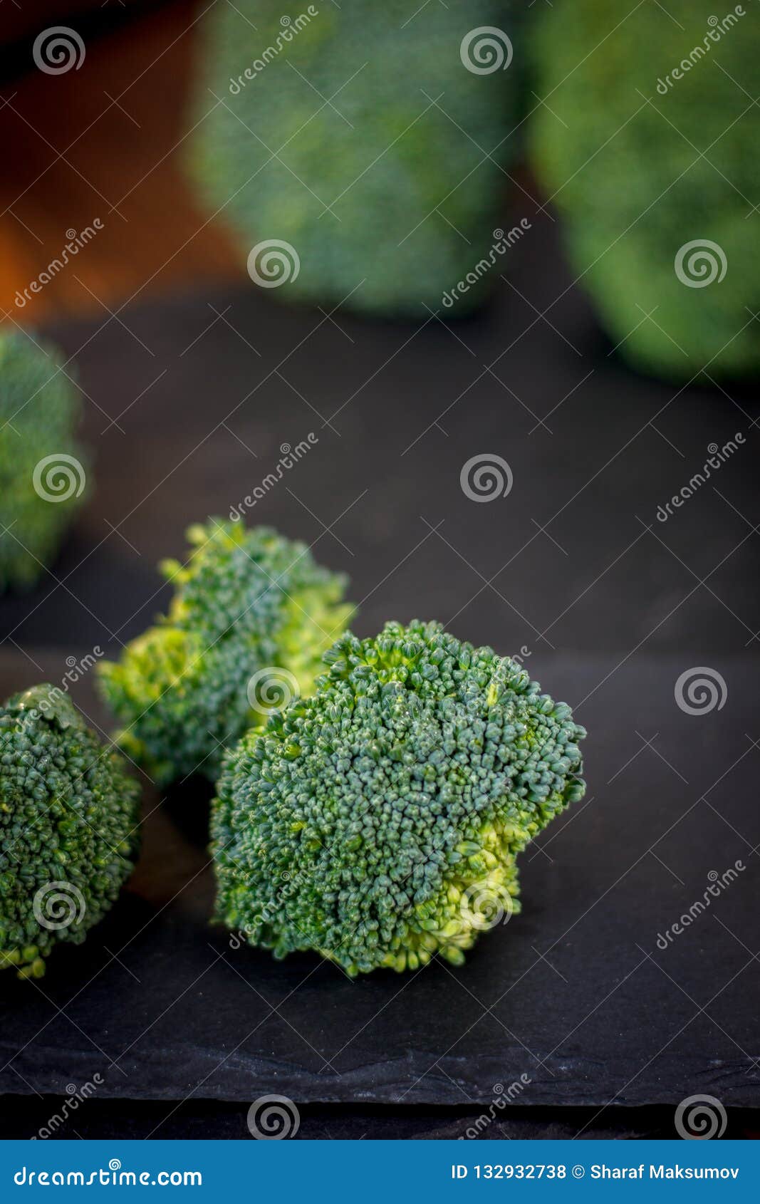 Nice Broccoli Crowns on a Black Slate Board Stock Photo - Image of ...