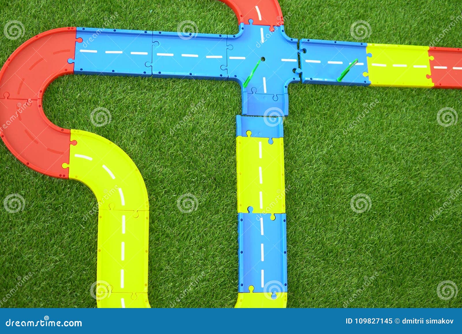 Children`s Toy Road on Green Grass Stock Image - Image of outdoor ...