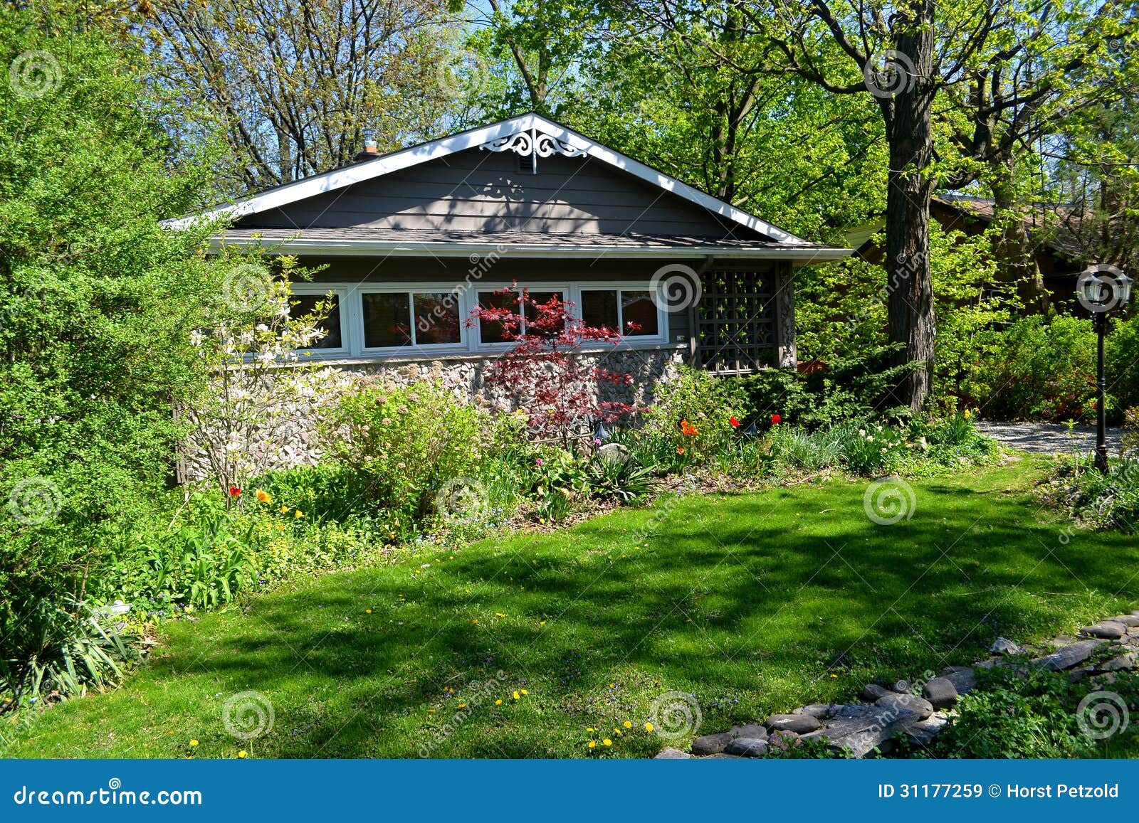 Nice cottage in spring. stock image. Image of antique - 31177259
