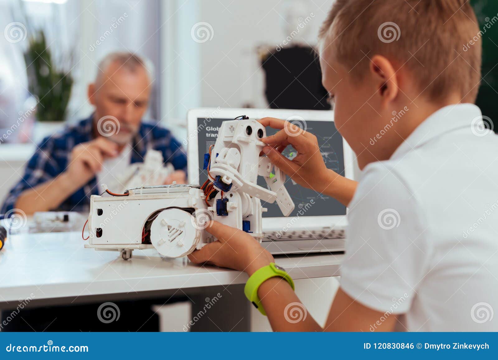 Nice Cute Boy Playing with a Robot Stock Photo - Image of innovative ...