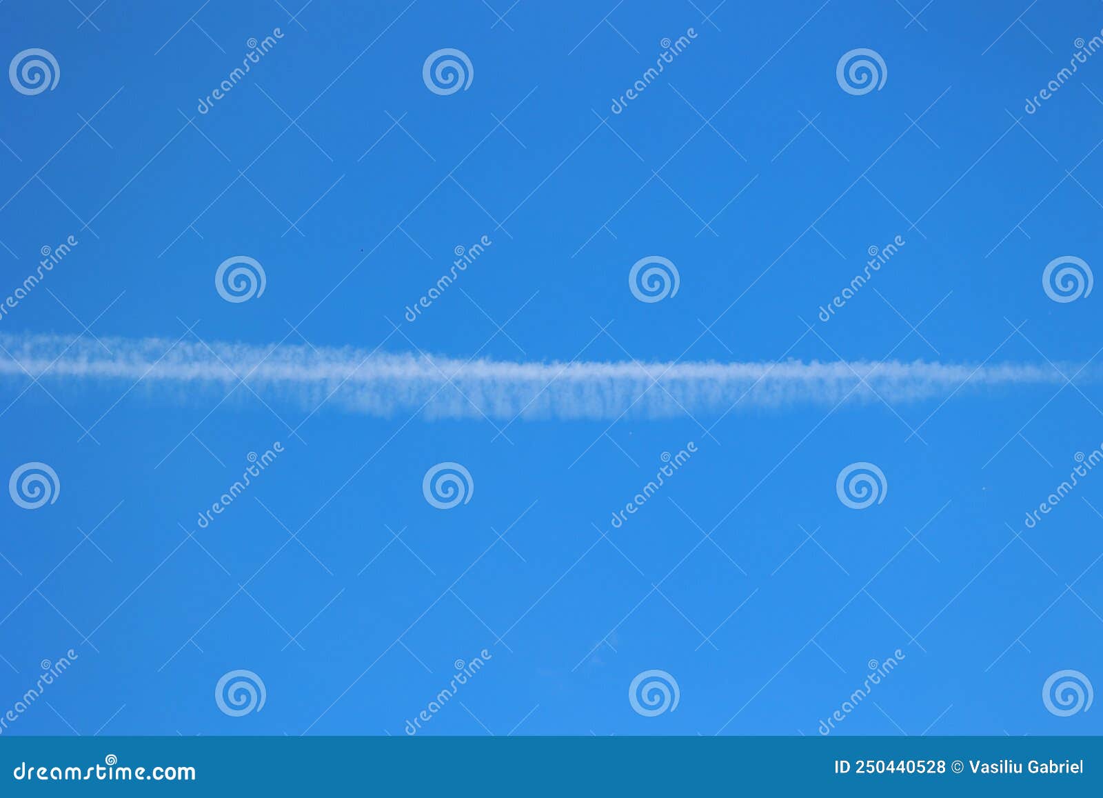Nice Day with Blue Sky and a Cloud Made by the Engine of an Airplane ...