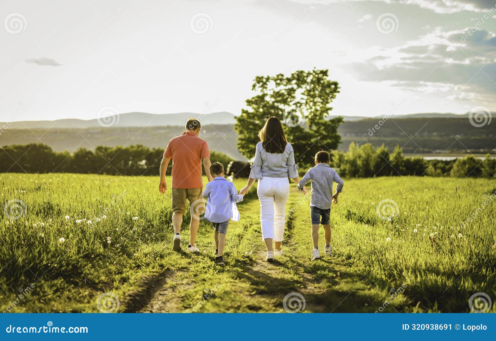 Nice Family Playing on Great Field at Sunset Stock Image - Image of ...