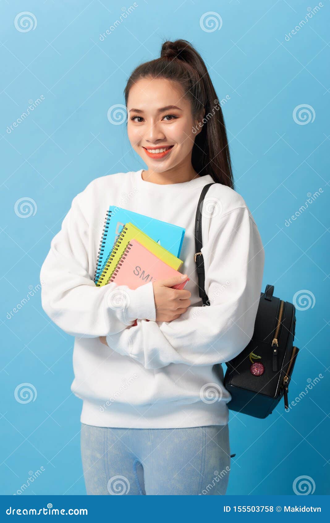 Nice Female Student Smiling and Looking at Camera Stock Photo - Image ...