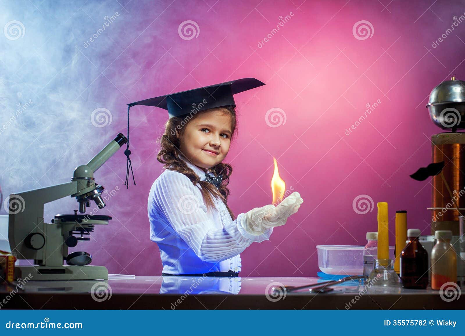 Nice Girl Conducting Physical Experience in Lab Stock Photo - Image of ...