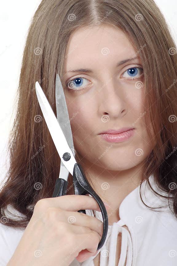 The nice girl and scissors stock image. Image of female - 12685943