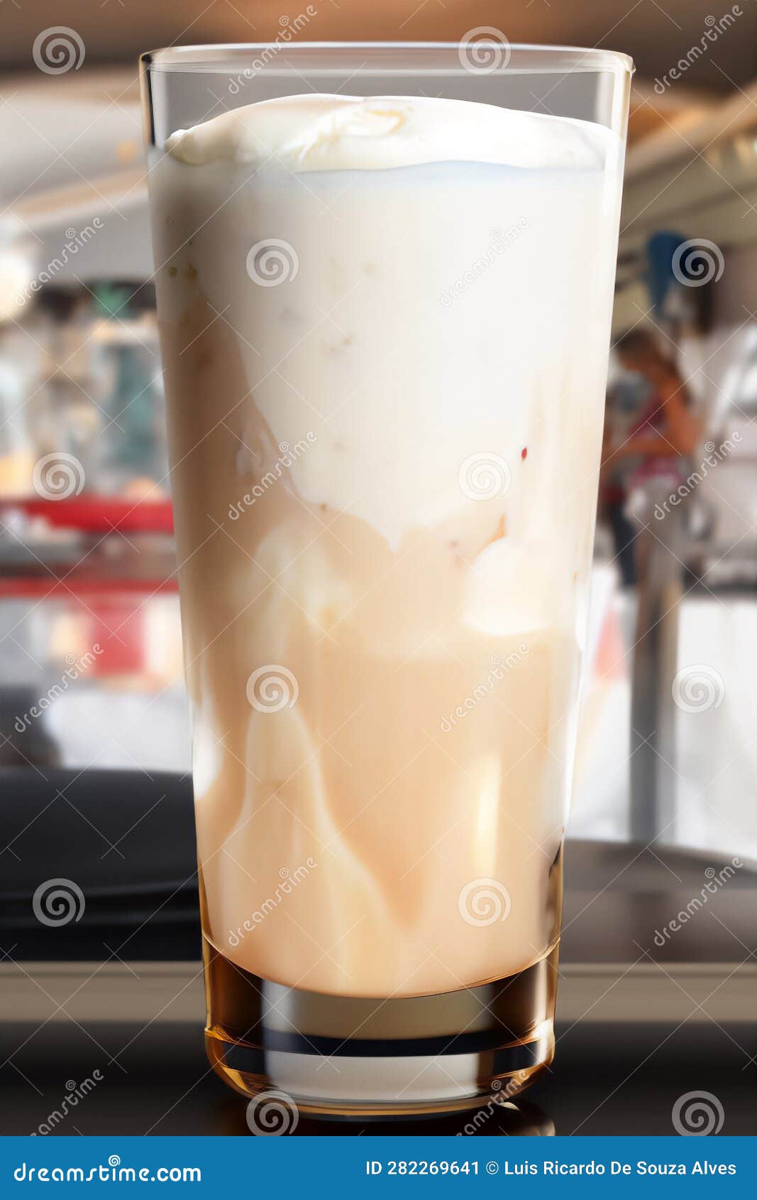 A Nice Glass with Milkshake on the Counter. in the Background, a Snack ...