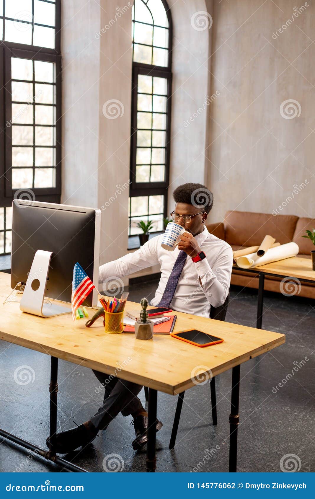 Nice Good Looking Man Focusing on His Work Stock Photo - Image of ...