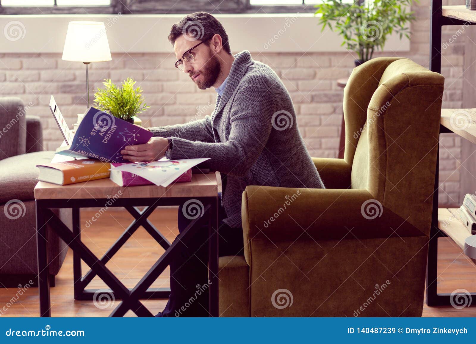 Nice Handsome Man Looking into the Book Stock Image - Image of device ...