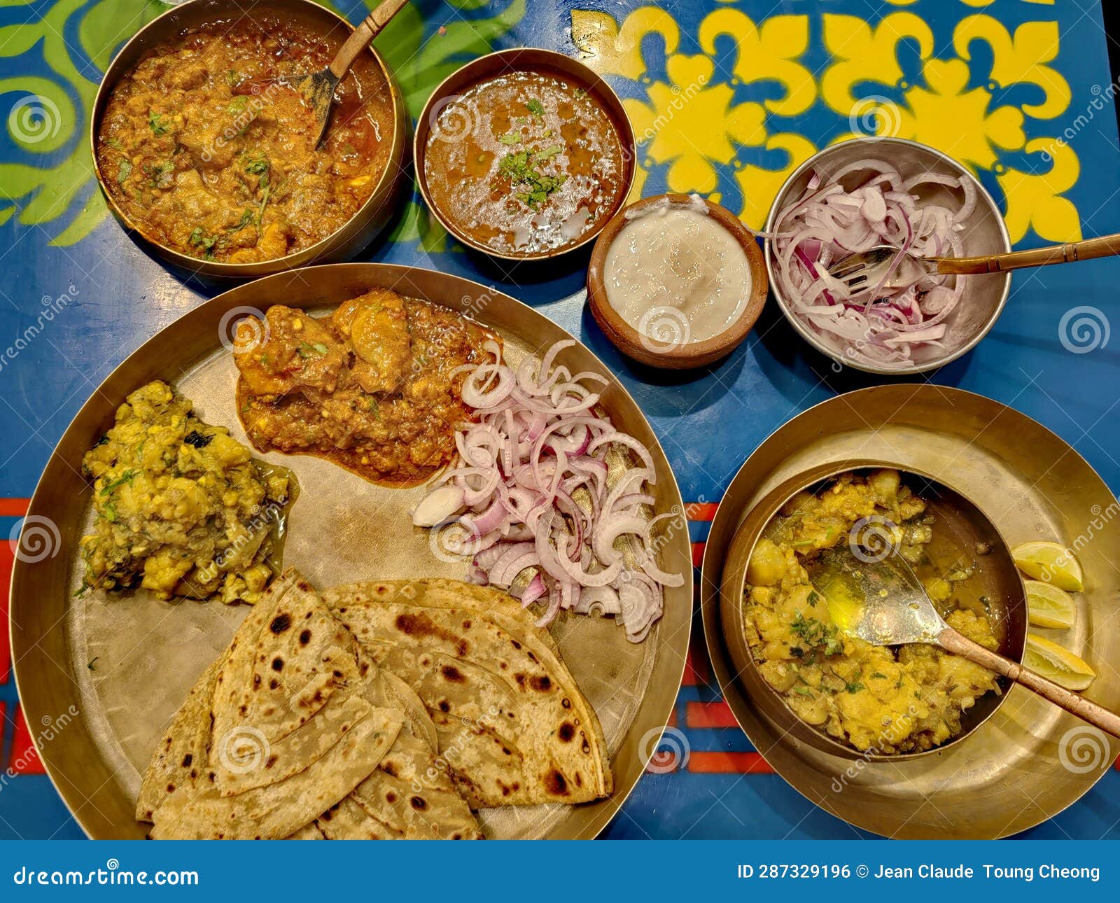 Nice Indian Dinner of Roti, Alu Gobi and Chicken Shaba. Stock Photo ...