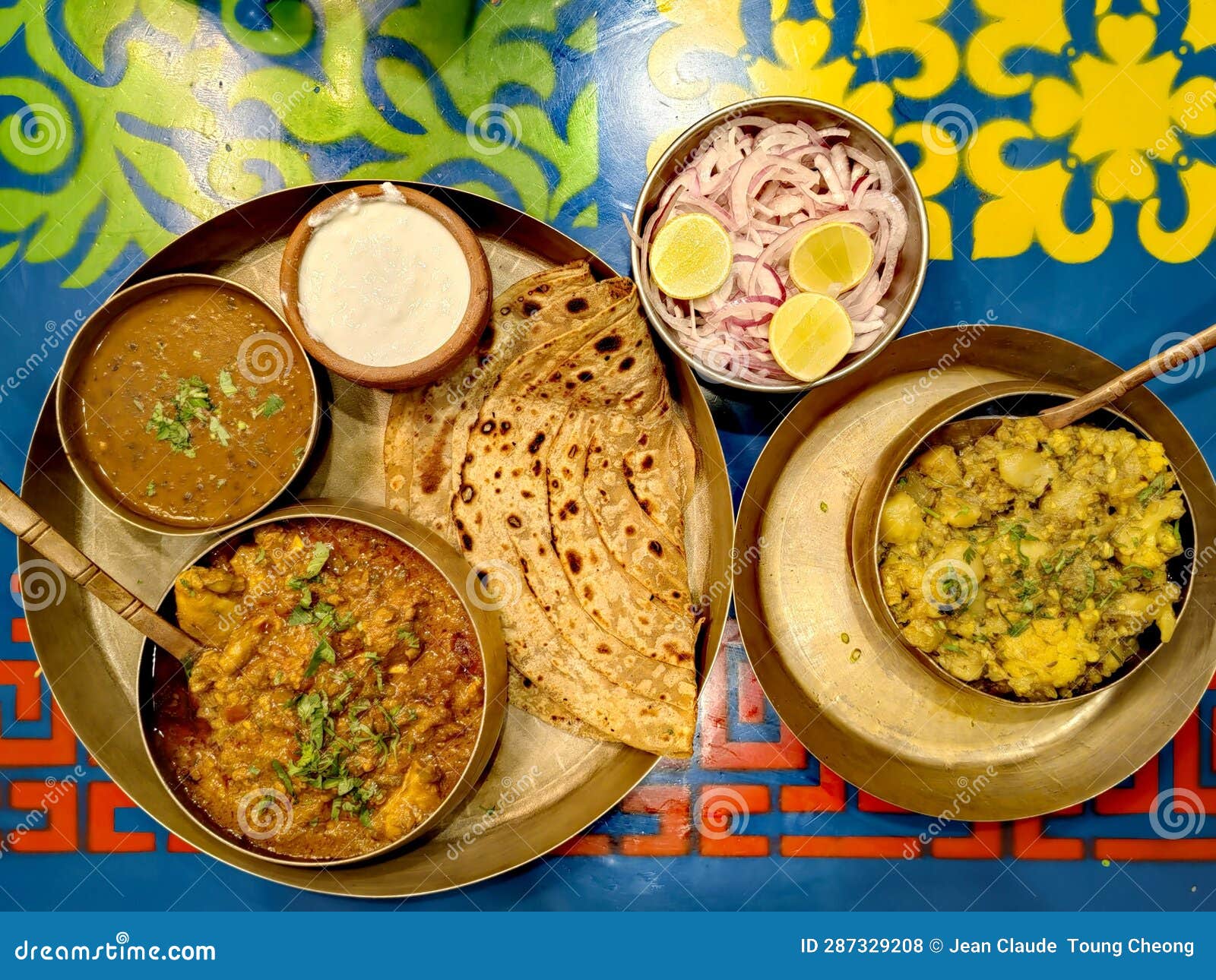 Nice Indian Dinner of Roti, Alu Gobi and Chicken Shaba. Stock Photo ...