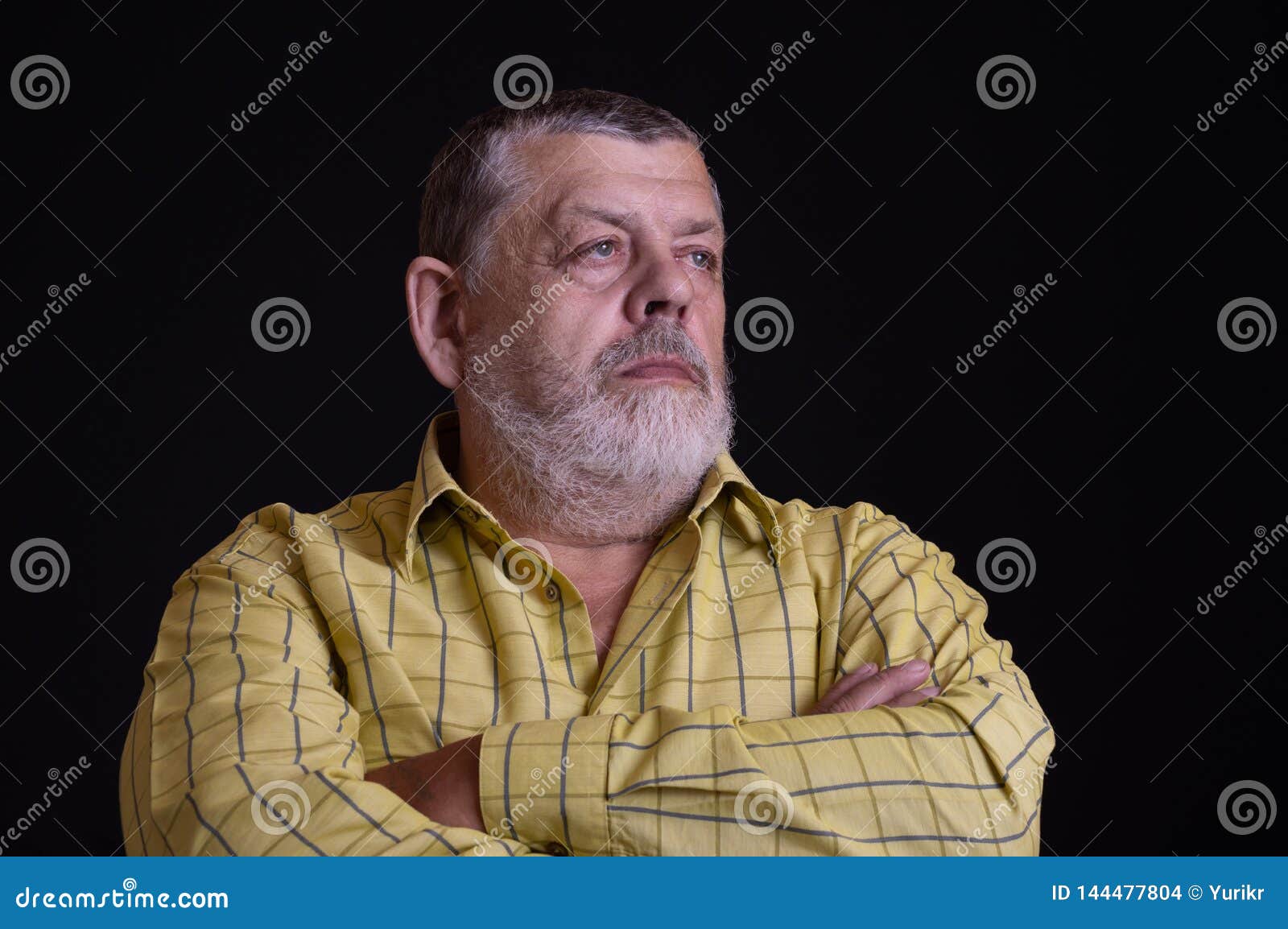 Portrait of a Thoughtful Caucasian, Bearded Senior Man in Yellow Shirt ... Portrait of a Thoughtful Caucasian, Bearded Senior Man in Yellow Shirt ...