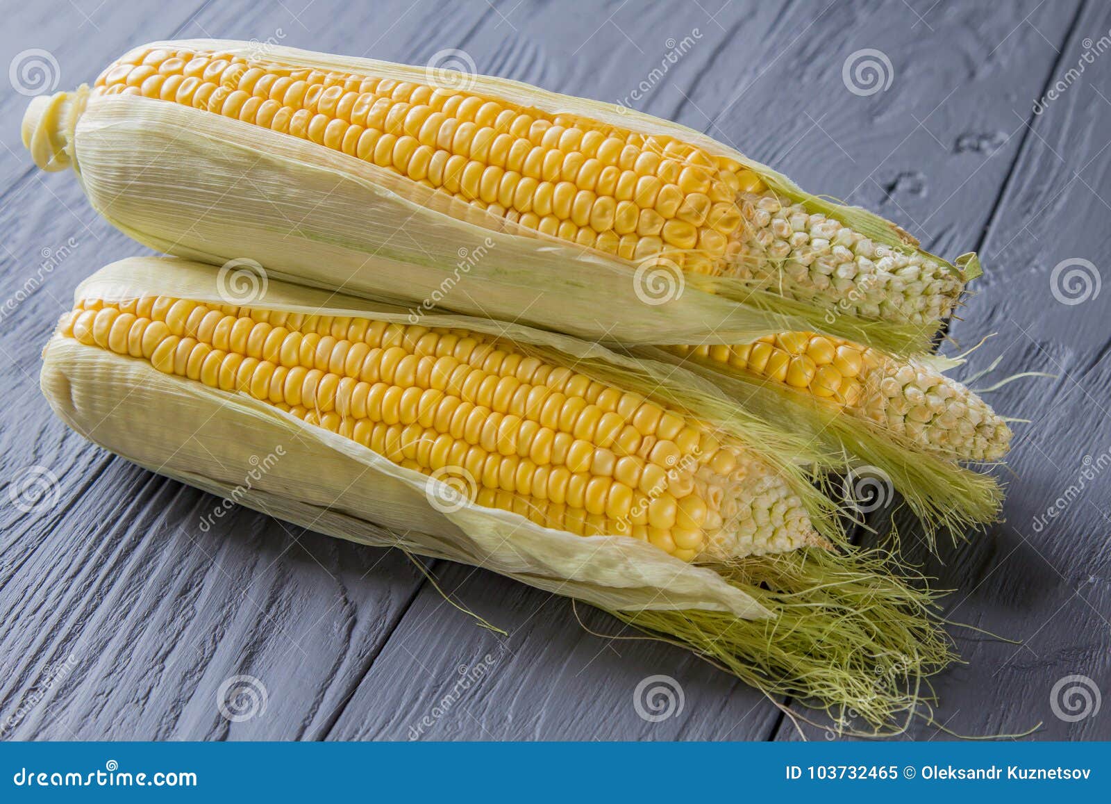 Macro View of Three Corn Cobs Pile on the Wooden Table. Nice Macro ...