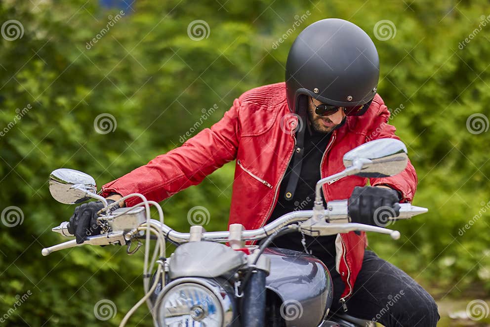 Man on a Chopper Motorcycle Stock Image - Image of pose, male: 221371181