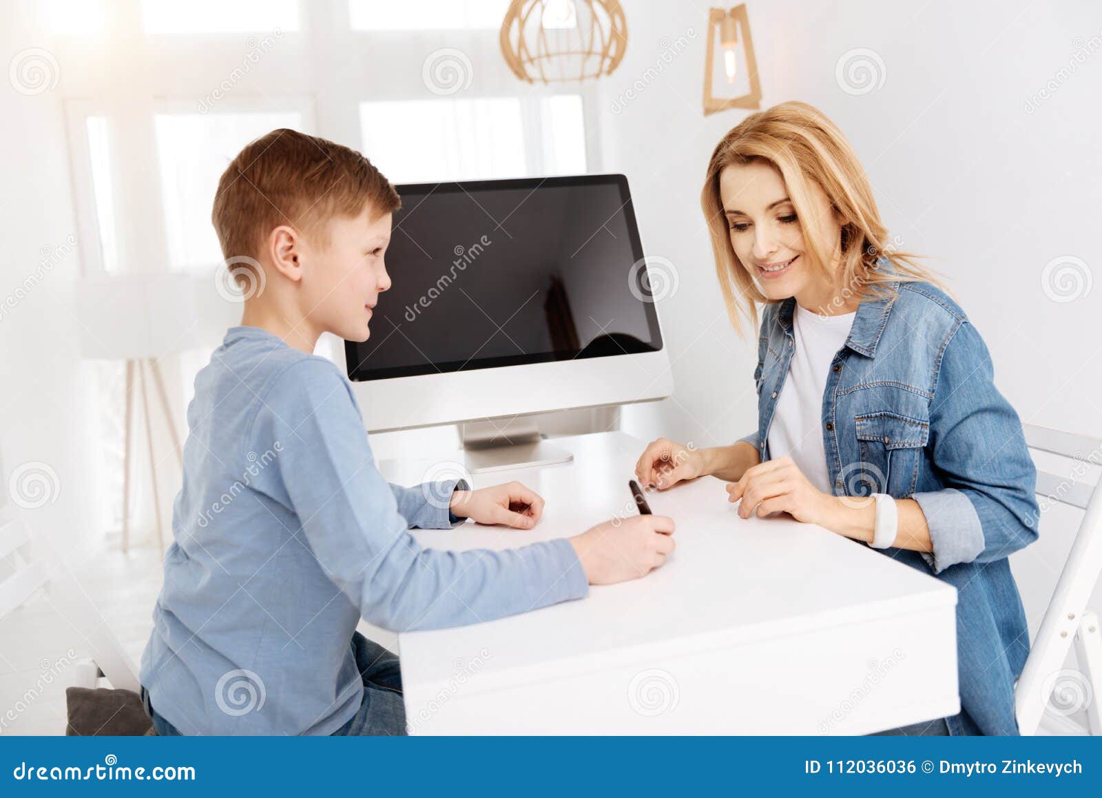 Nice positive boy studying stock photo. Image of digital - 112036036