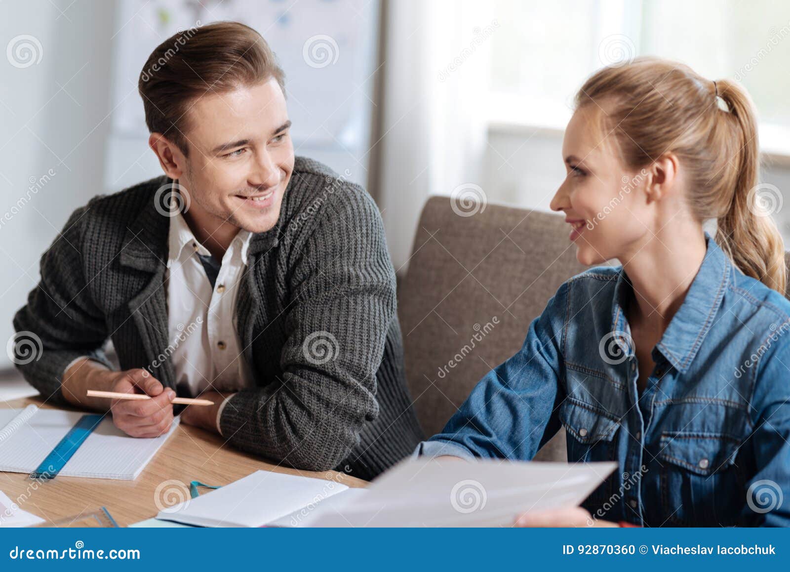 Nice Positive Colleagues Looking at Each Other Stock Photo - Image of ...