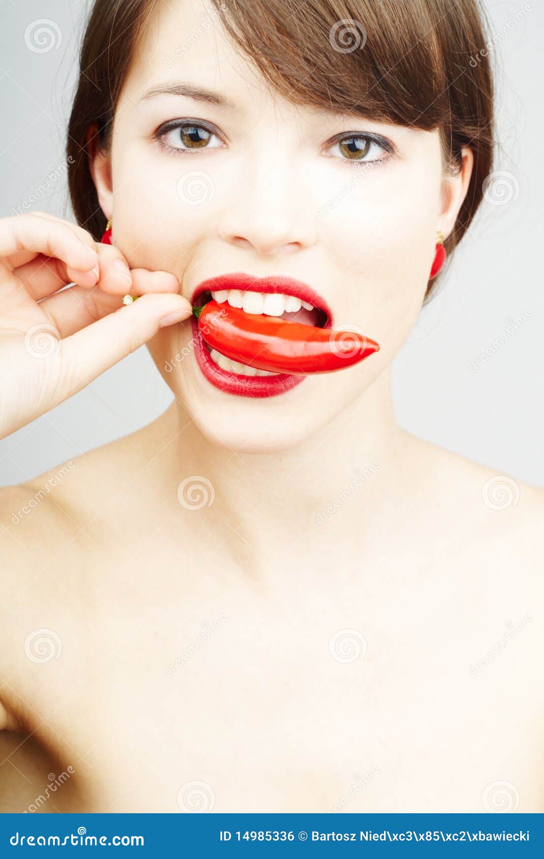 Nice Pretty Woman Biting a Chili Pepper Stock Photo - Image of meal ...