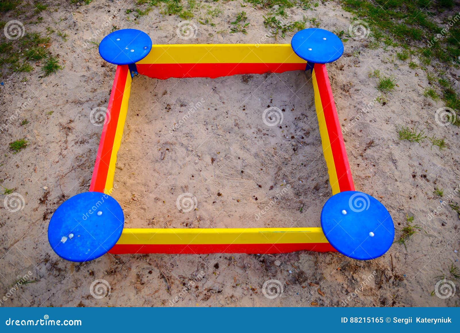 A Nice Sandbox Playground Filled . Surrounded by Green Grass, Stock ...