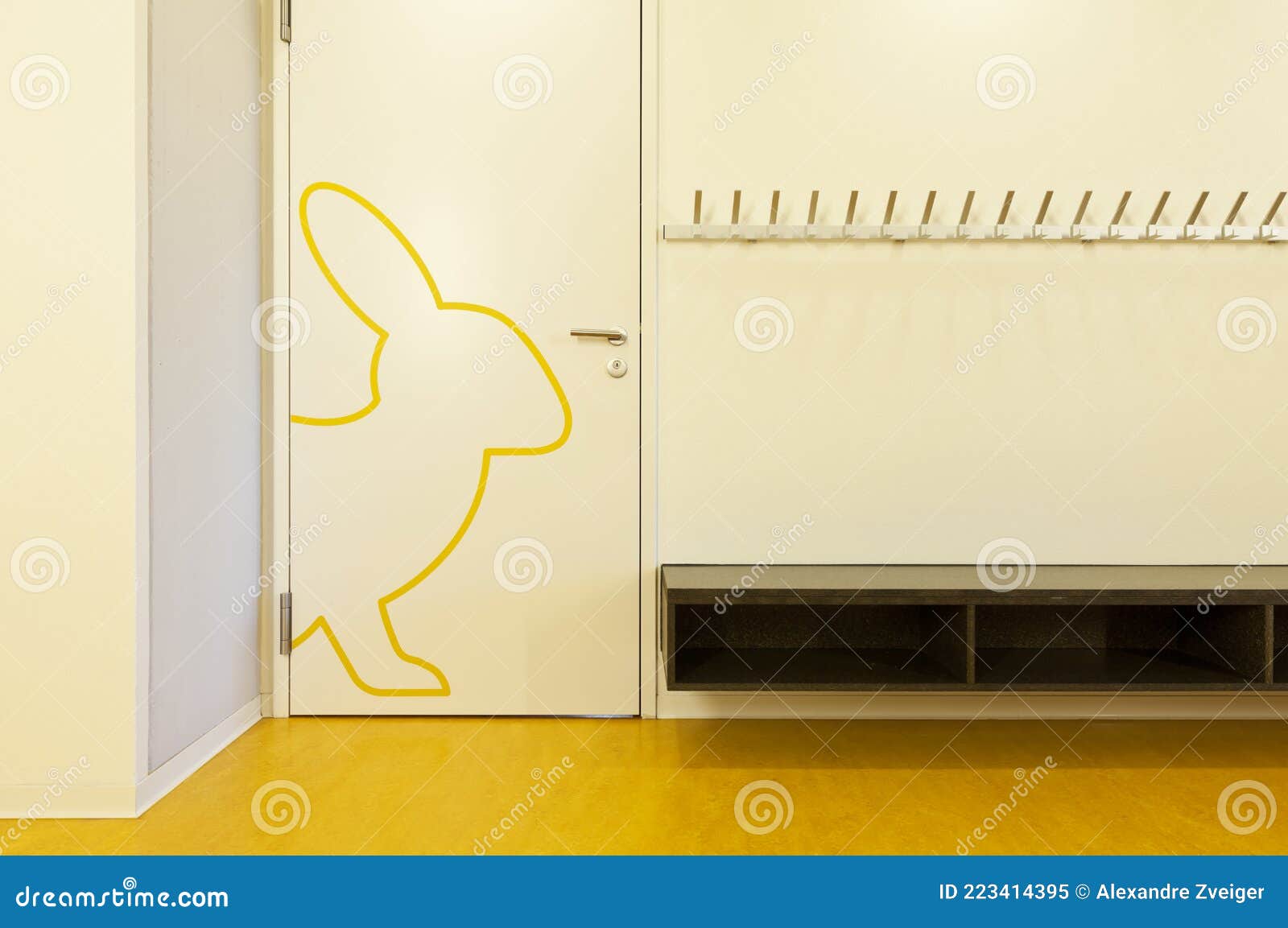 Detail of a Door of a Children`s School. a Rabbit is Drawn in Yellow ...