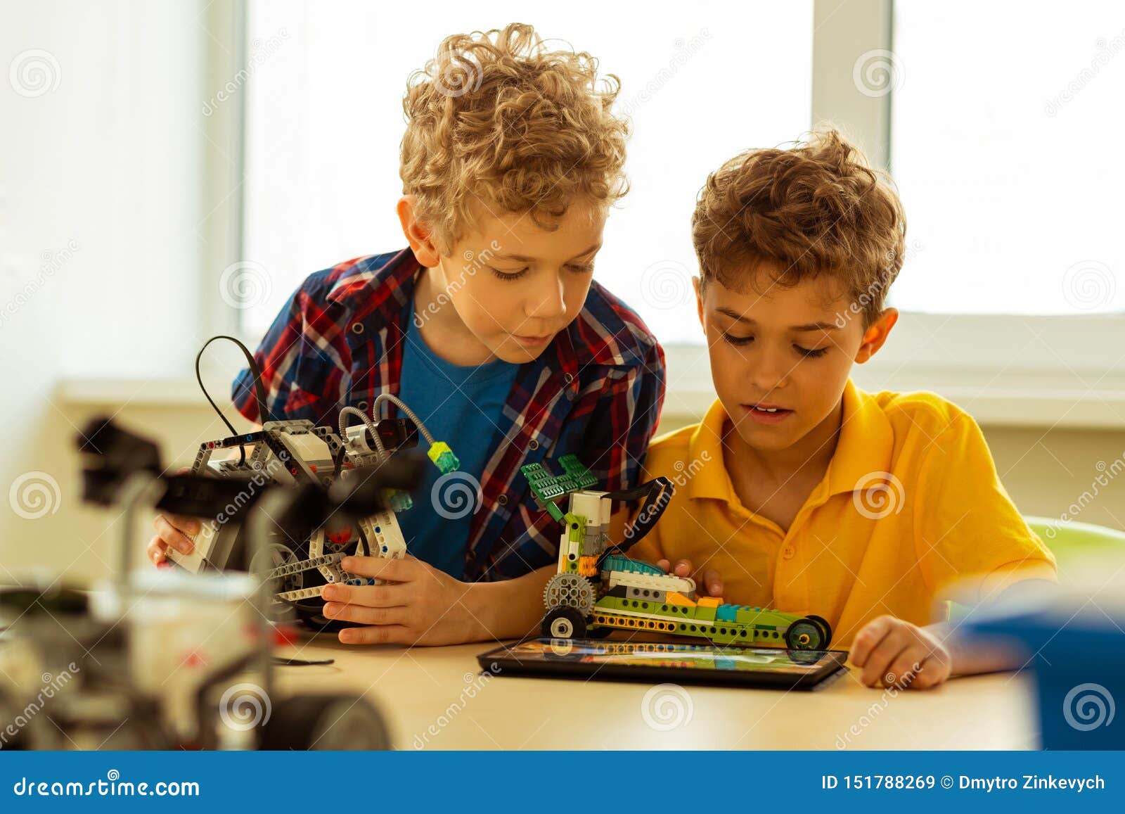 Nice Serious Boys Looking at the Scheme Stock Image - Image of creative ...