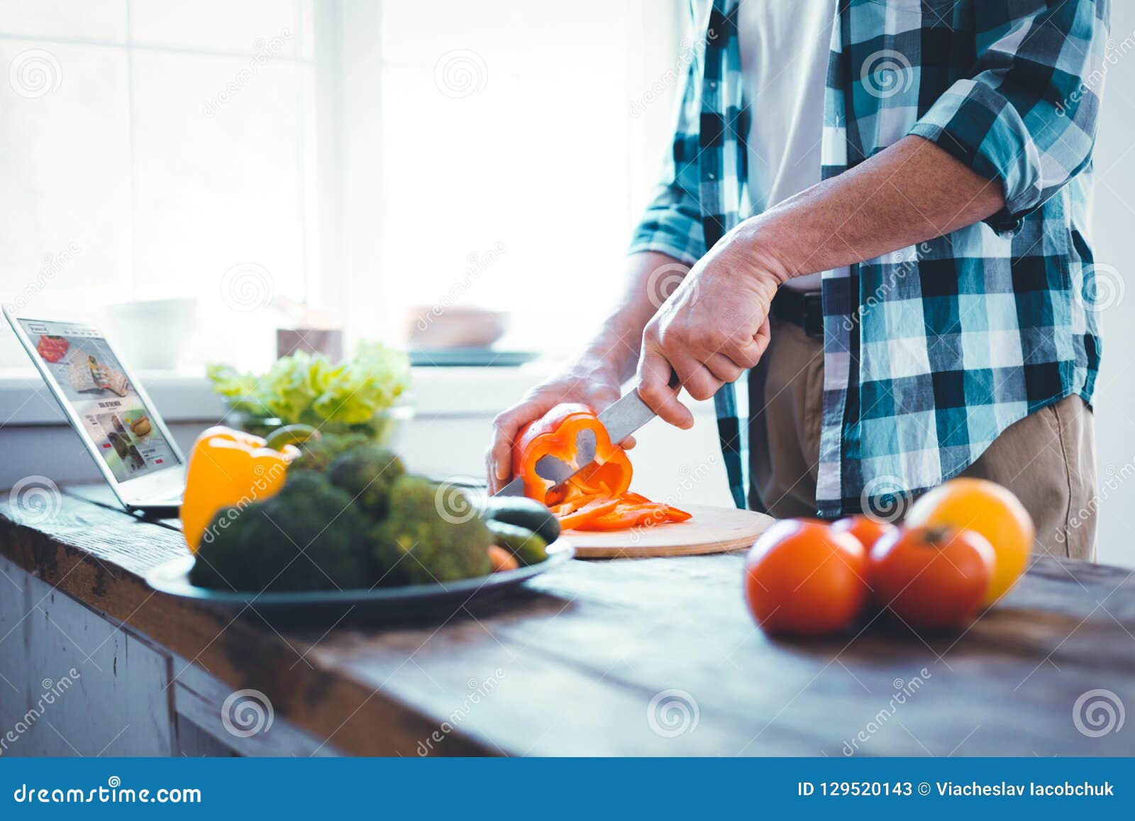 Nice Skilled Man Cutting Vegetables into Slices Stock Image - Image of ...