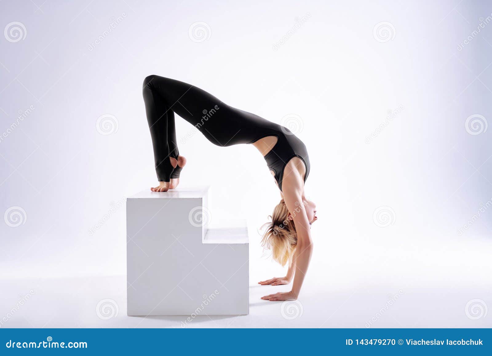 Nice Skilled Young Gymnast Doing a Backbend Stock Photo - Image of ...