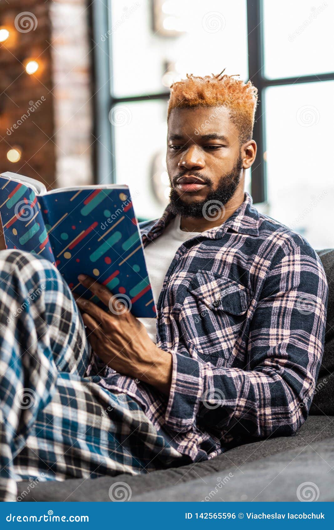 Nice Smart Man Getting New Knowledge from the Book Stock Photo - Image ...
