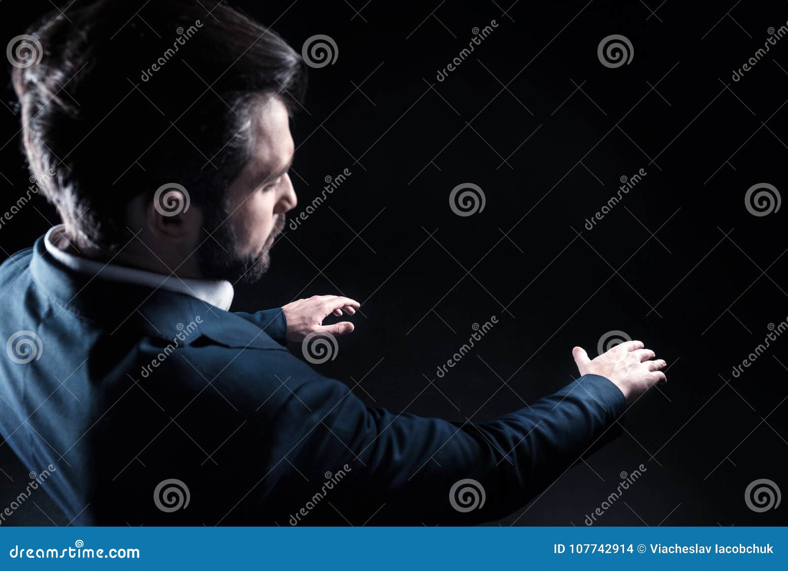 Nice Smart Man Looking at His Hands Stock Photo - Image of interaction ...