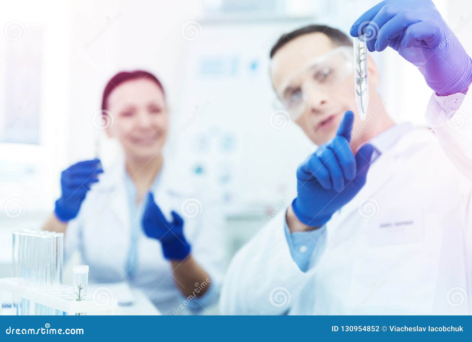 Nice Smart Man Pointing at the Test Tube Stock Photo - Image of ...