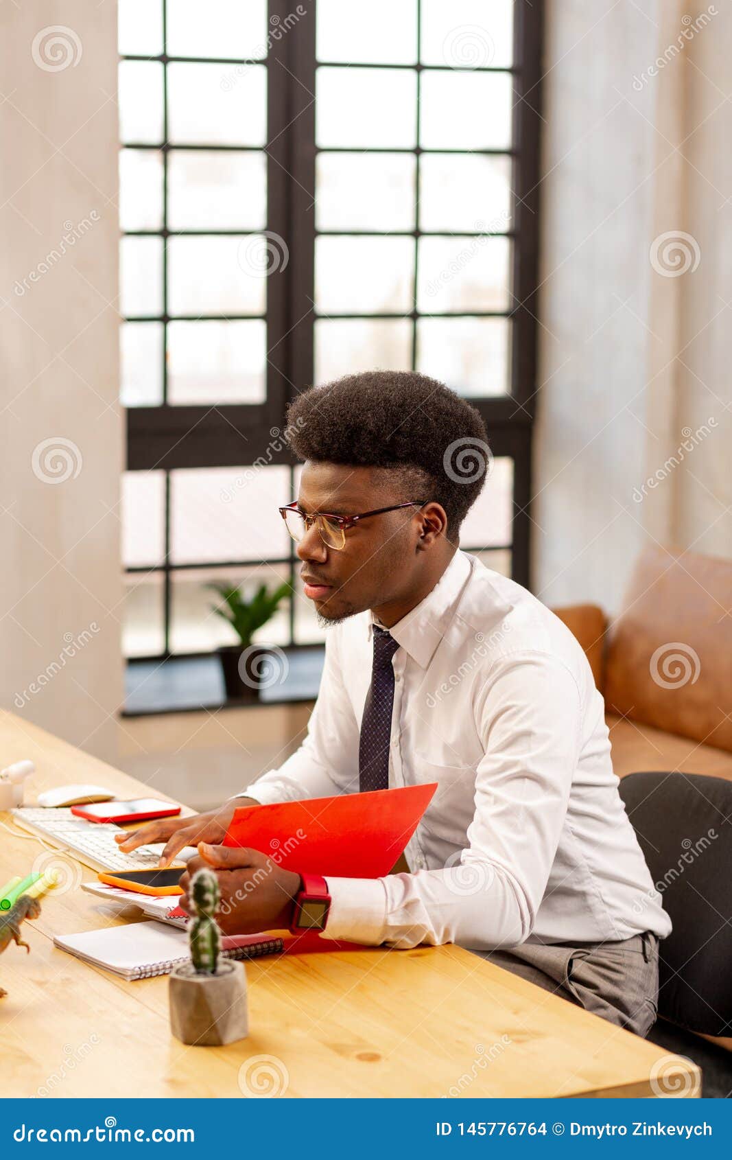 Nice Smart Man Sitting at the Office Desk Stock Photo - Image of ...