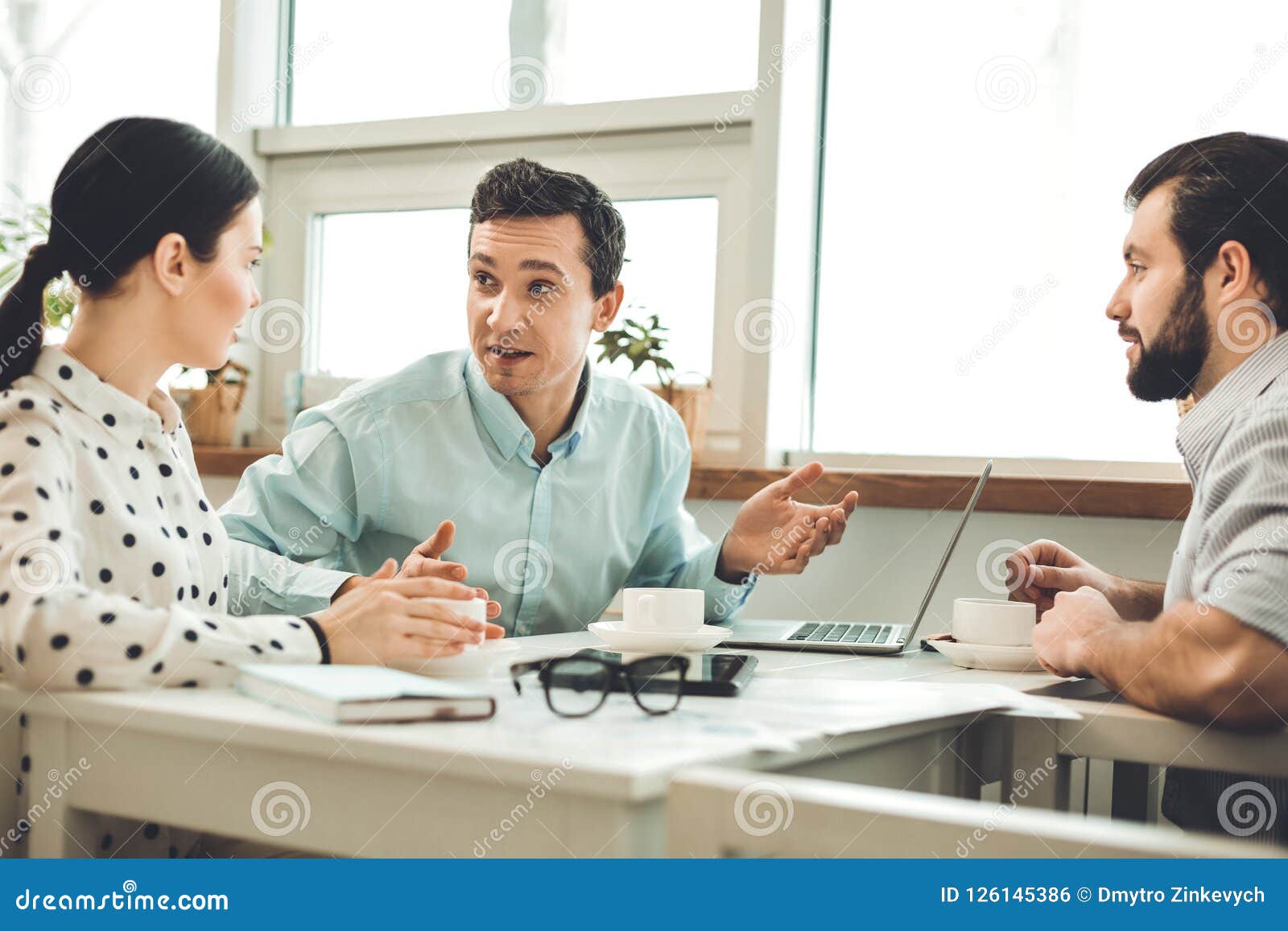Nice Smart People Sitting at the Table Stock Photo - Image of ...