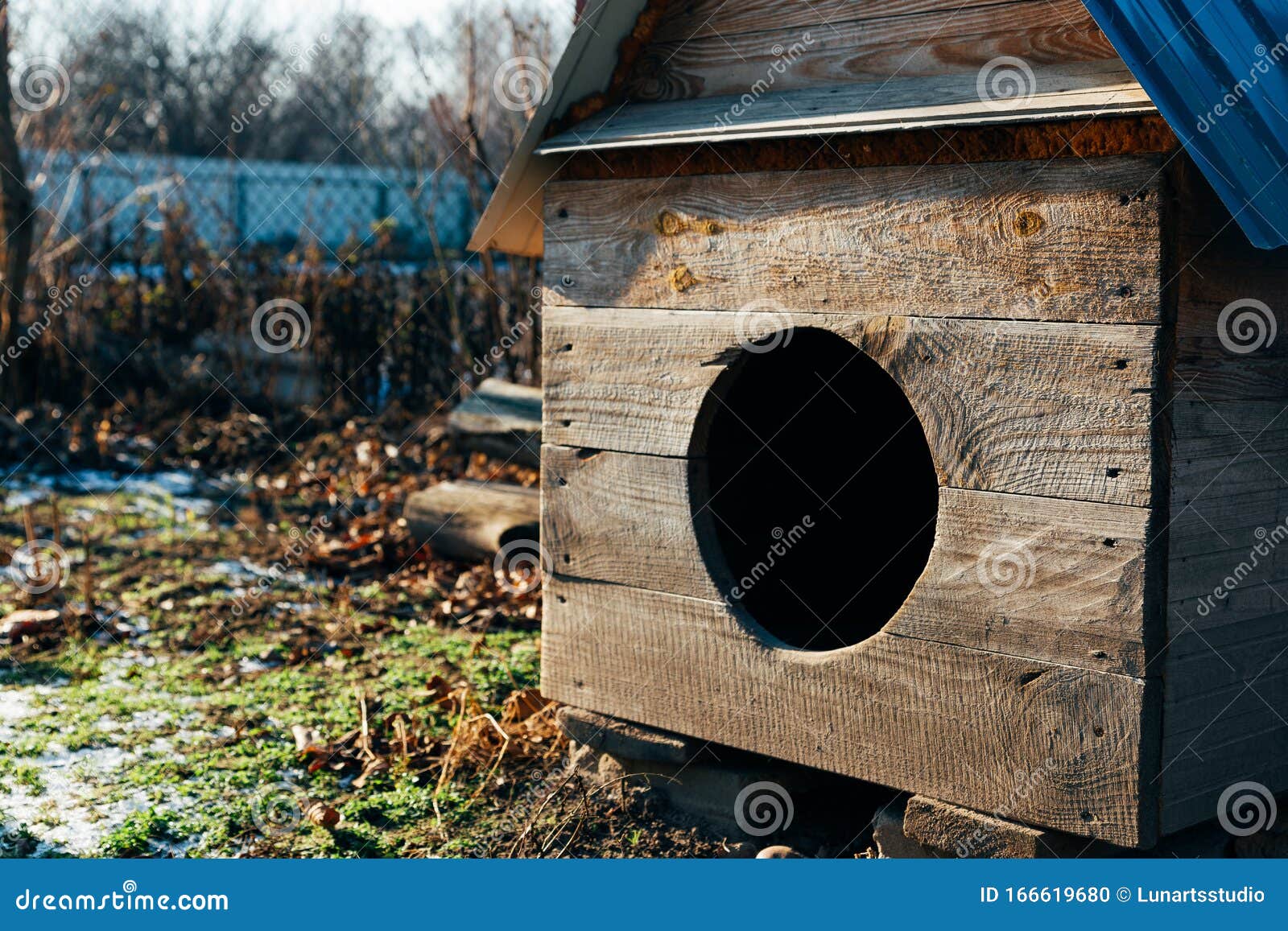 Nice Solid Wooden Doghouse without a Dog with an Empty Bowl. Outdoors ...
