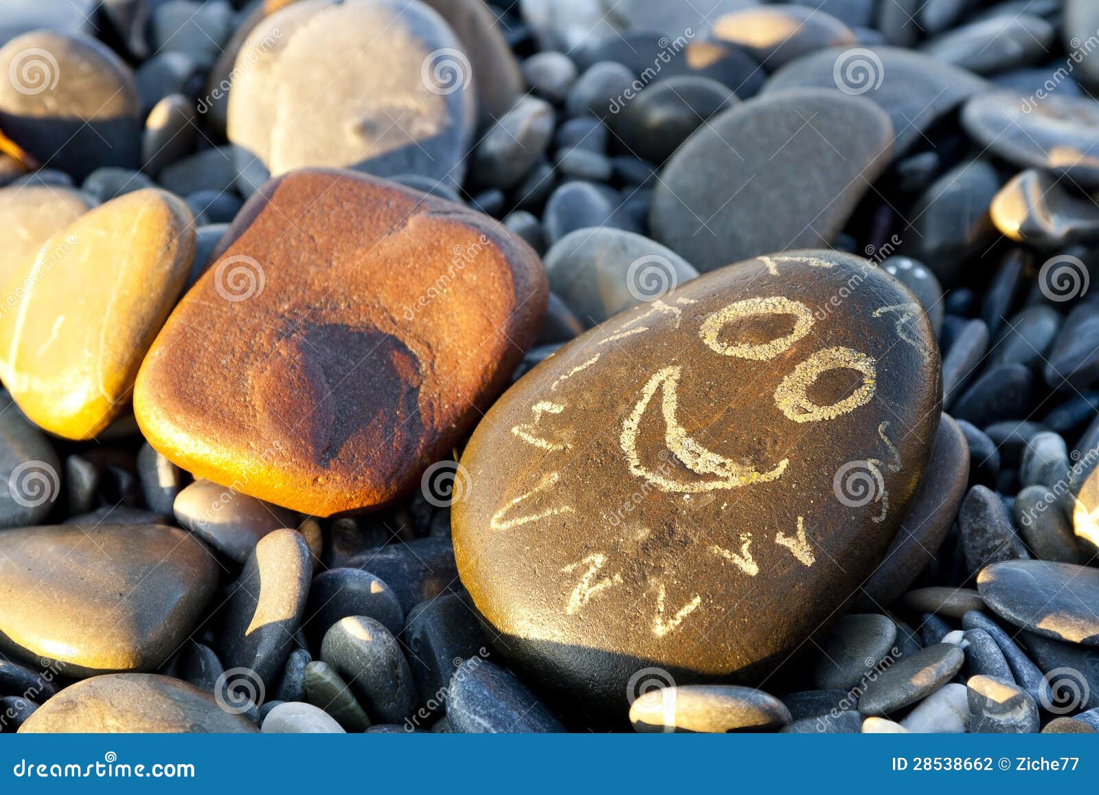 A Nice Stone with a Painted Face Stock Photo - Image of gray, brick ...