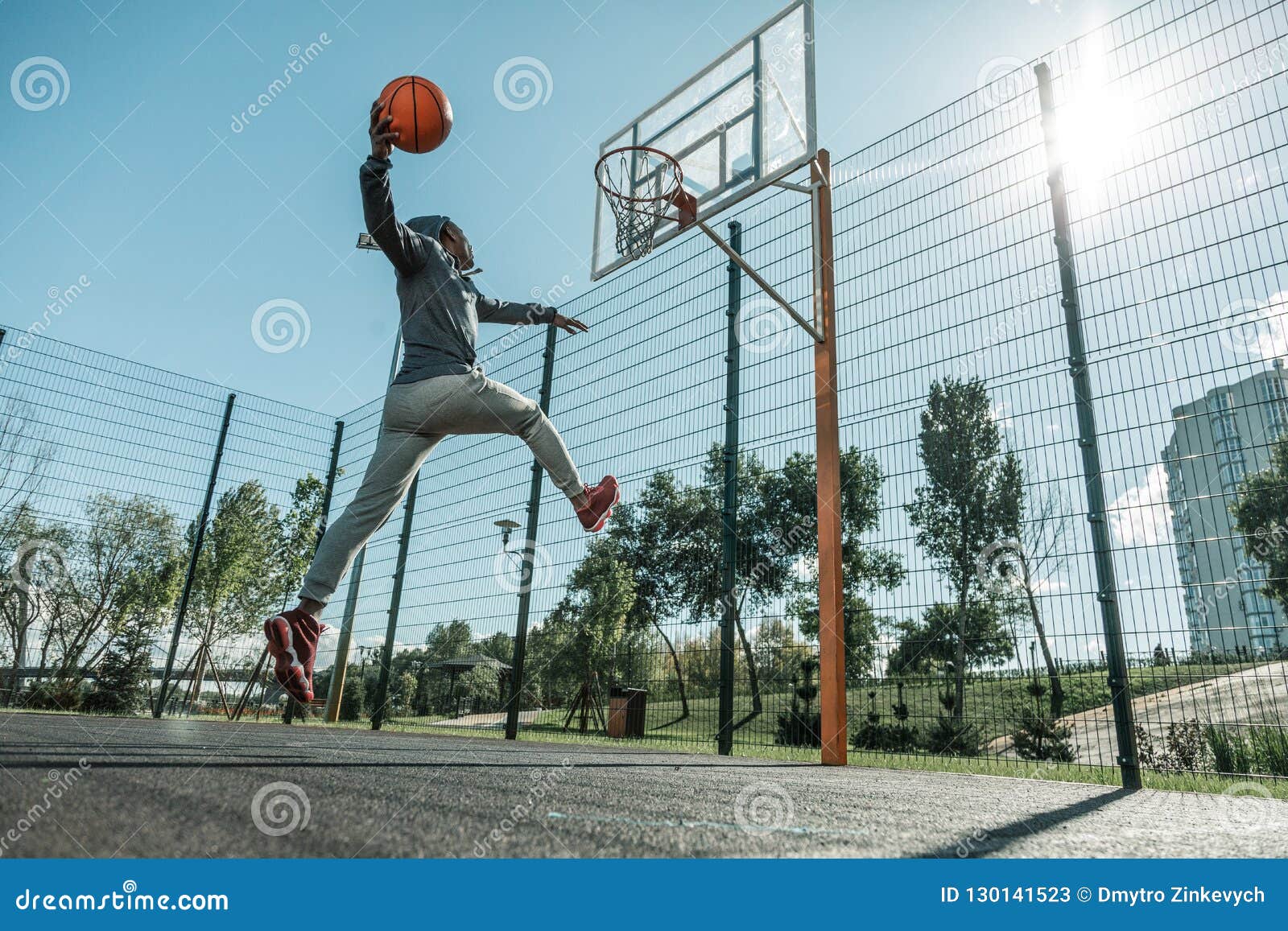 Nice Strong Man Jumping while Throwing a Ball Stock Image - Image of ...
