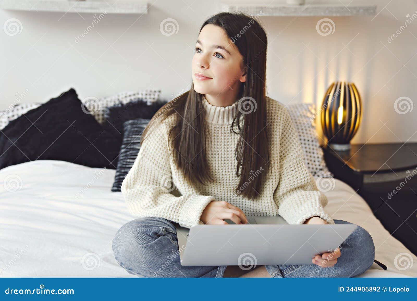 Nice Teenage Girl Using a Computer in Her Bedroom. Stock Photo - Image ...