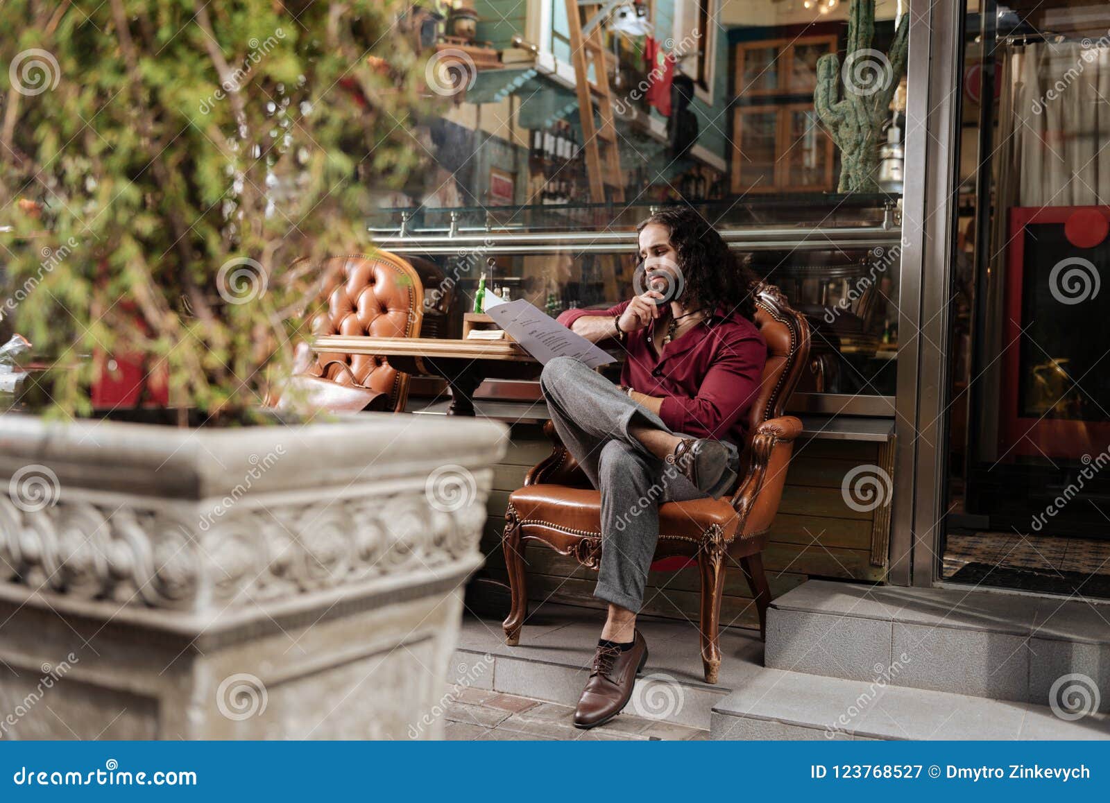 Nice Thoughtful Man Holding the Menu Stock Image - Image of hispanic ...