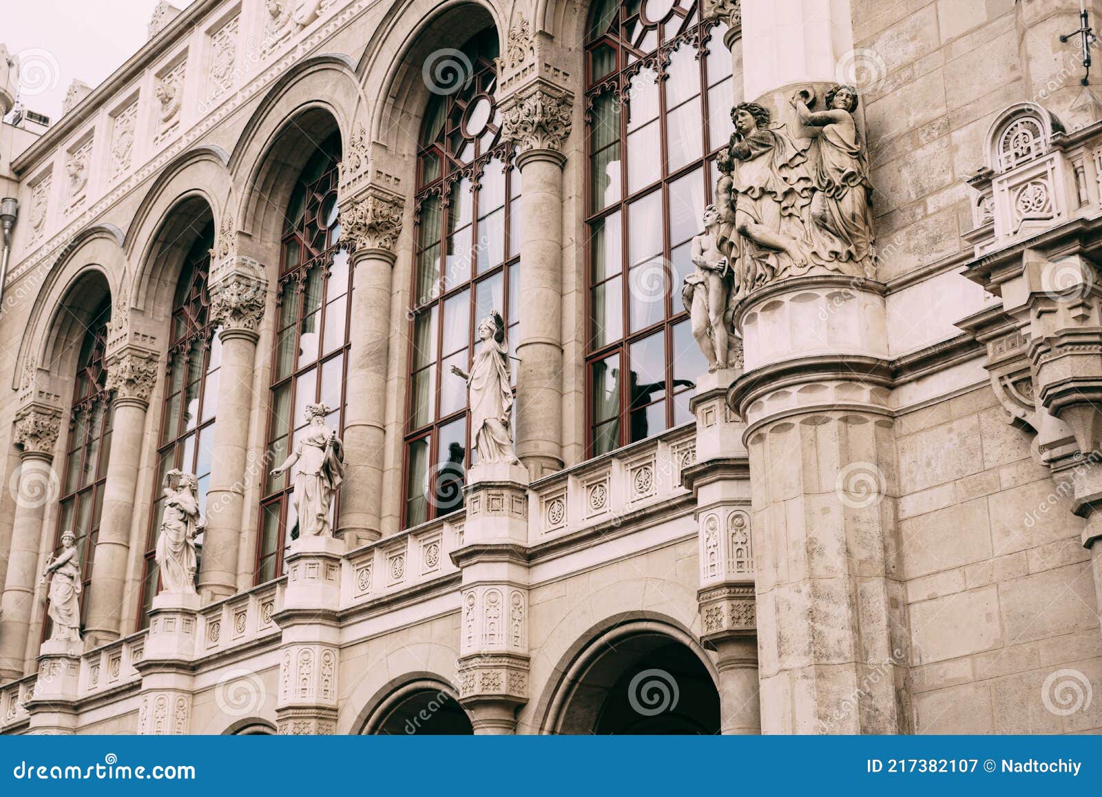 Nice View of a Building with Statues on the Facade and High Vaulted ...