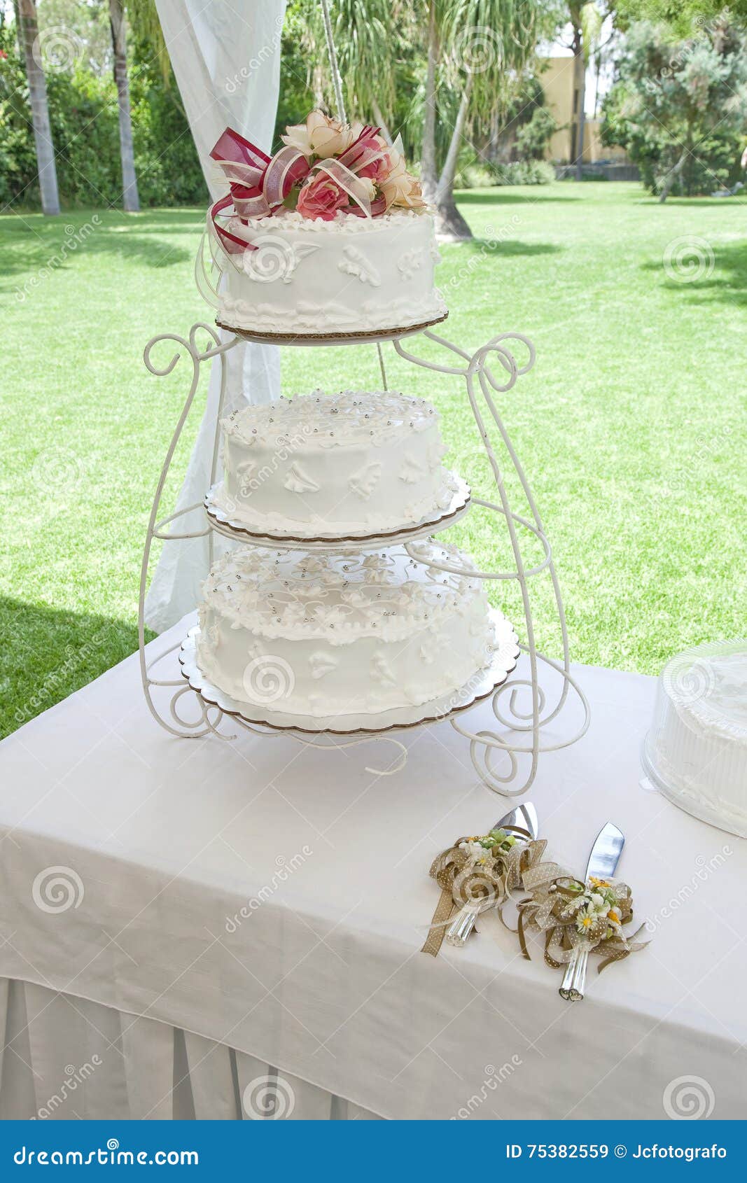 Nice wedding cake stock image. Image of couple, white - 75382559