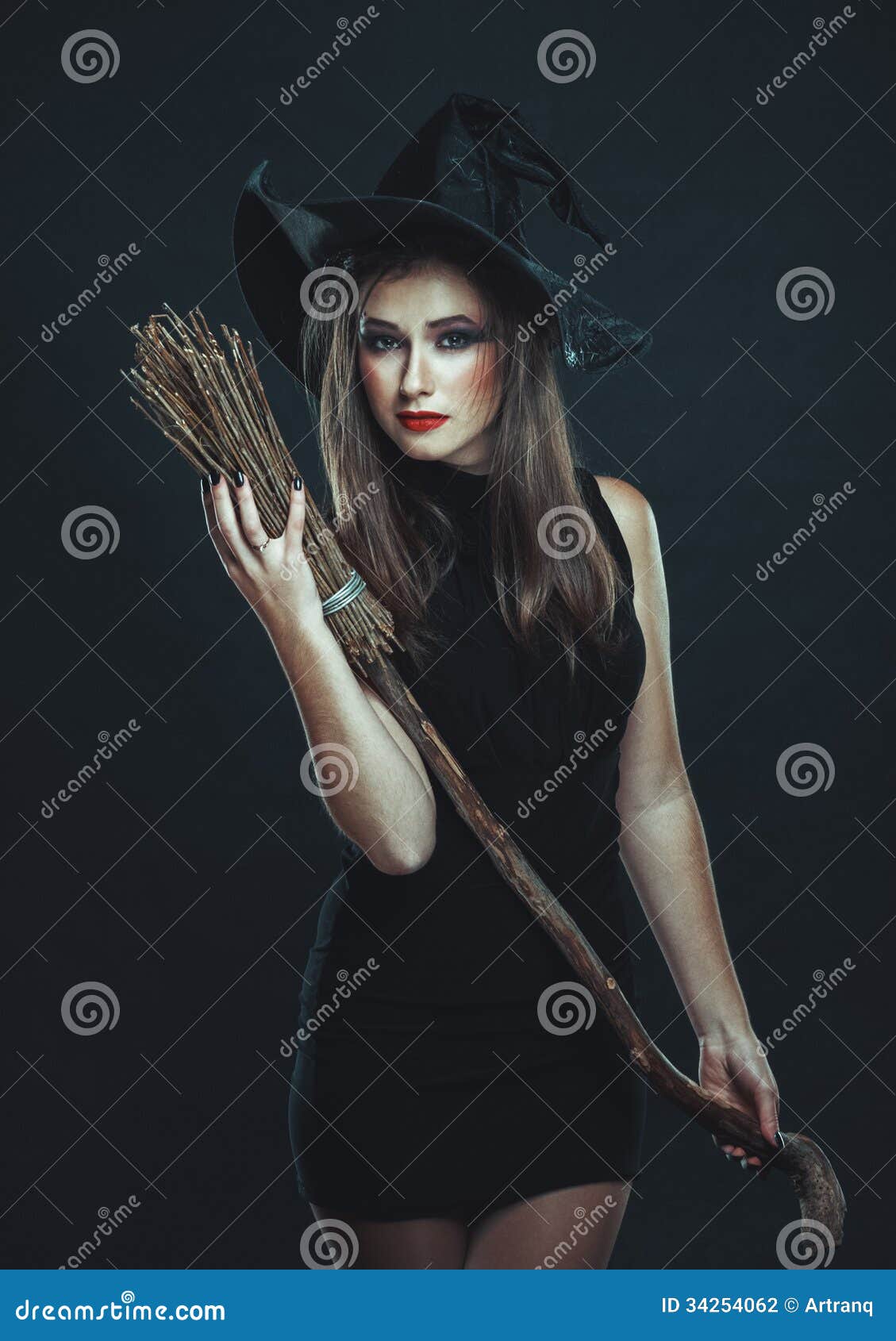 The Nice Witch with a Broom in Studio Stock Photo - Image of beautiful ...