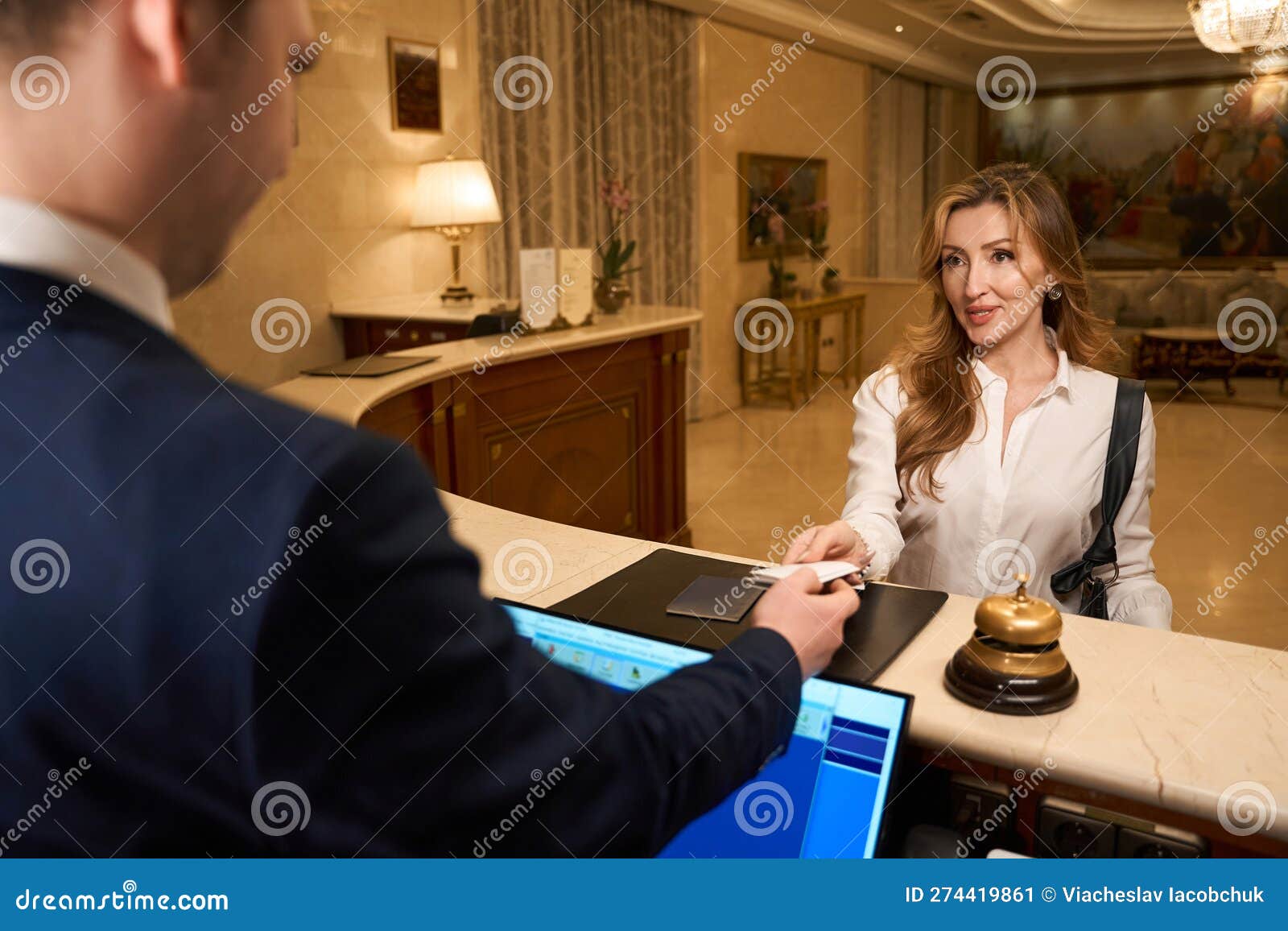 Nice Woman Checks in at the Reception Desk Stock Image - Image of ...